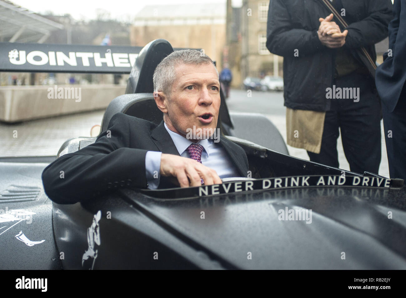 Former professional racing driver Mika Hakkinen poses with the Johnnie ...