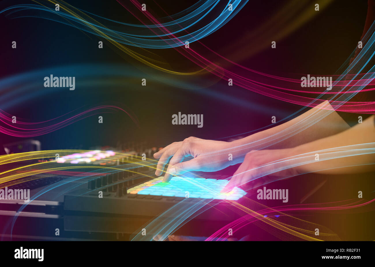 Hand mixing music on midi controller with colorful vibe concept Stock ...