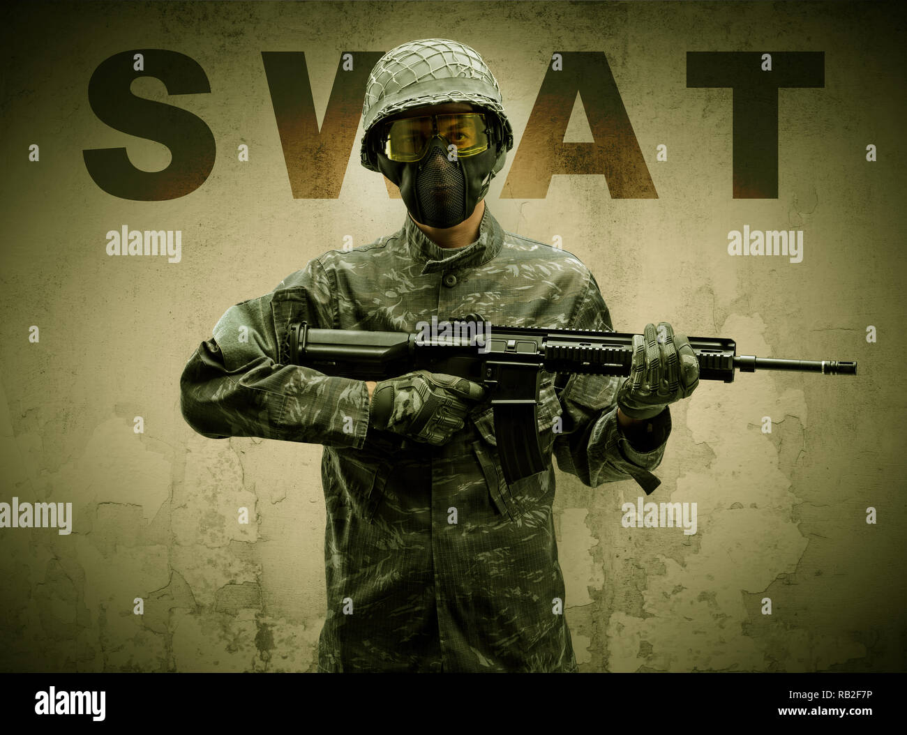 Uniformed armed soldier with damaged wall background Stock Photo - Alamy