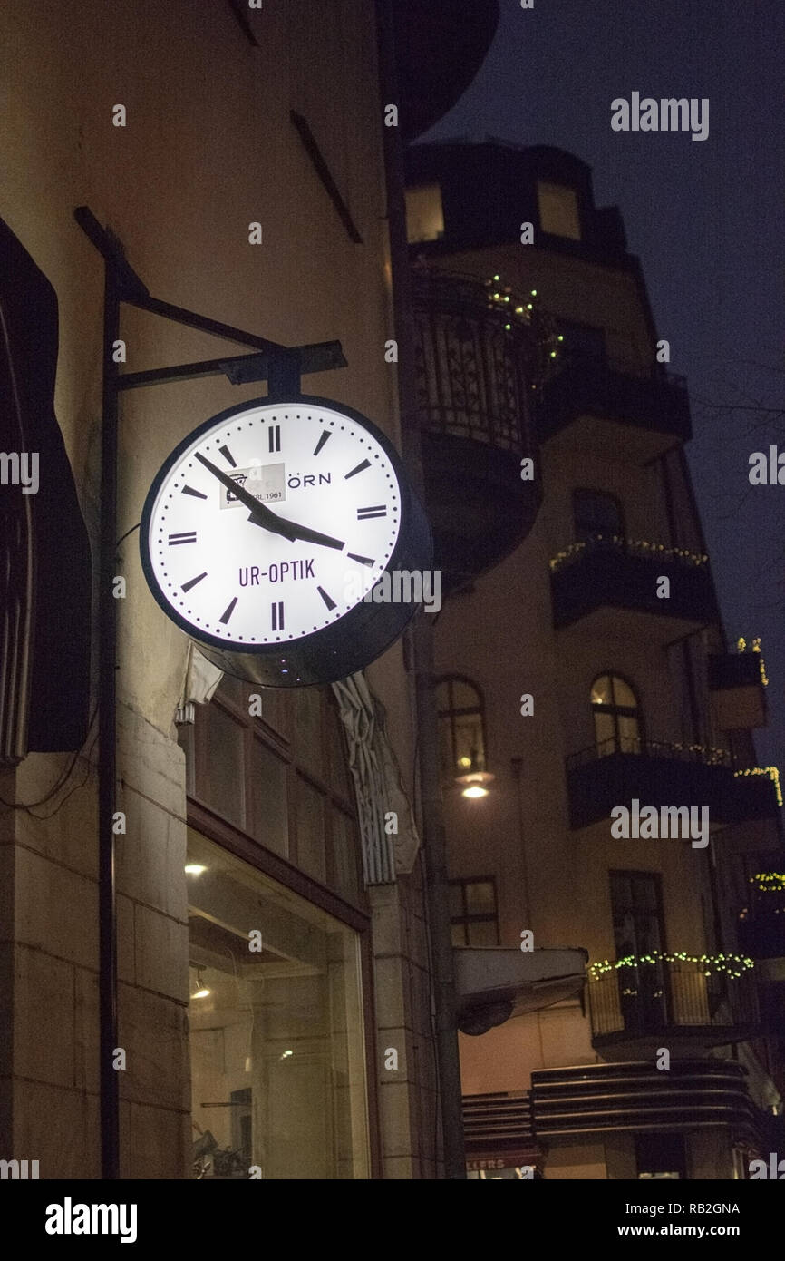 STOCKHOLM, SWEDEN - DECEMBER 29, 2018: Old street clock shows almost 4 ...