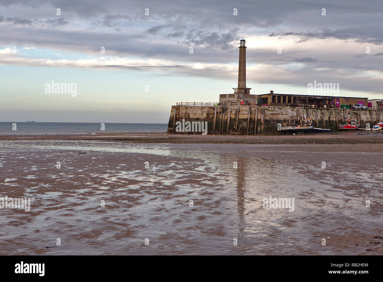 Reflection of pier side in water hi-res stock photography and images ...