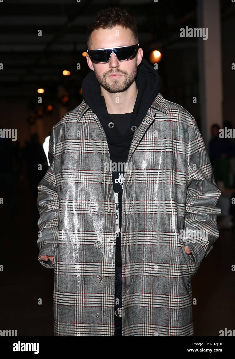 Marcus Butler on the front row during the Christopher Raeburn at London ...