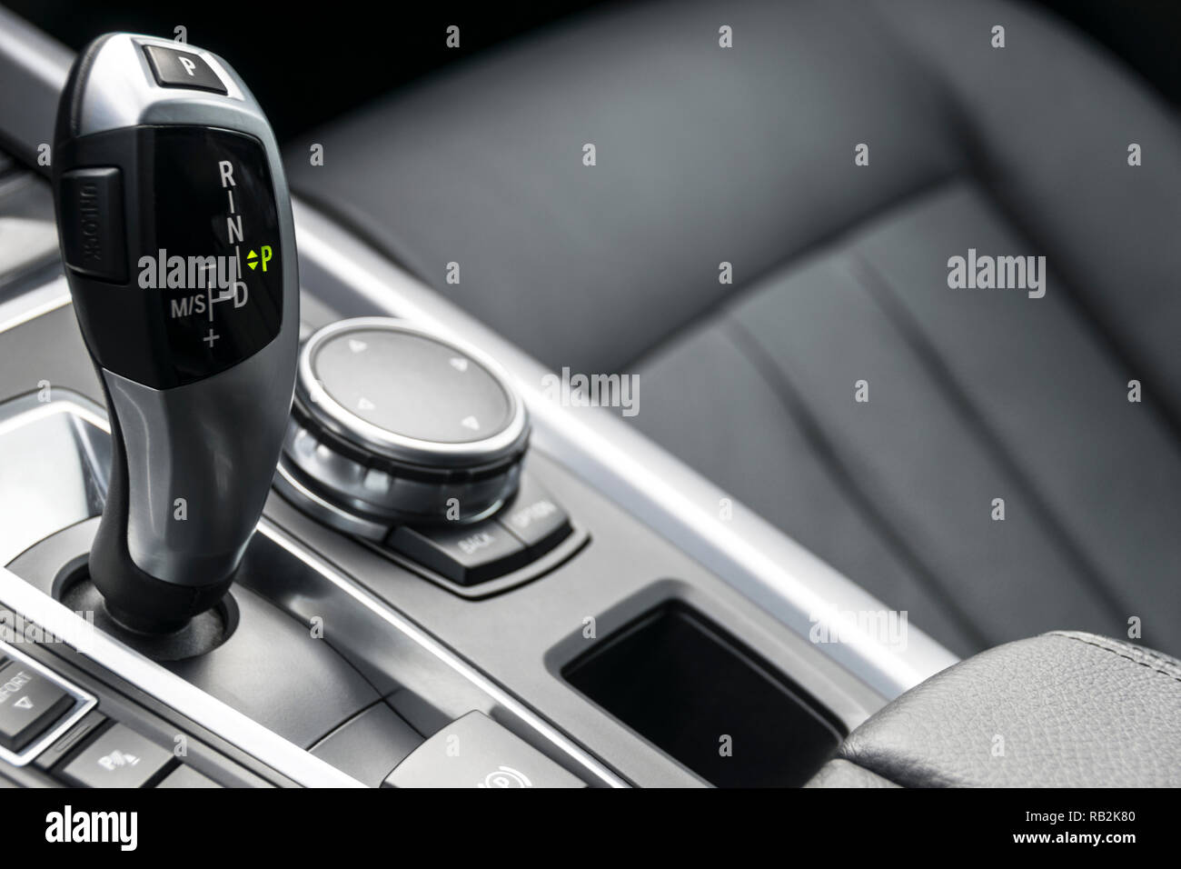 automatic gear stick of a modern car, car interior details Stock Photo ...