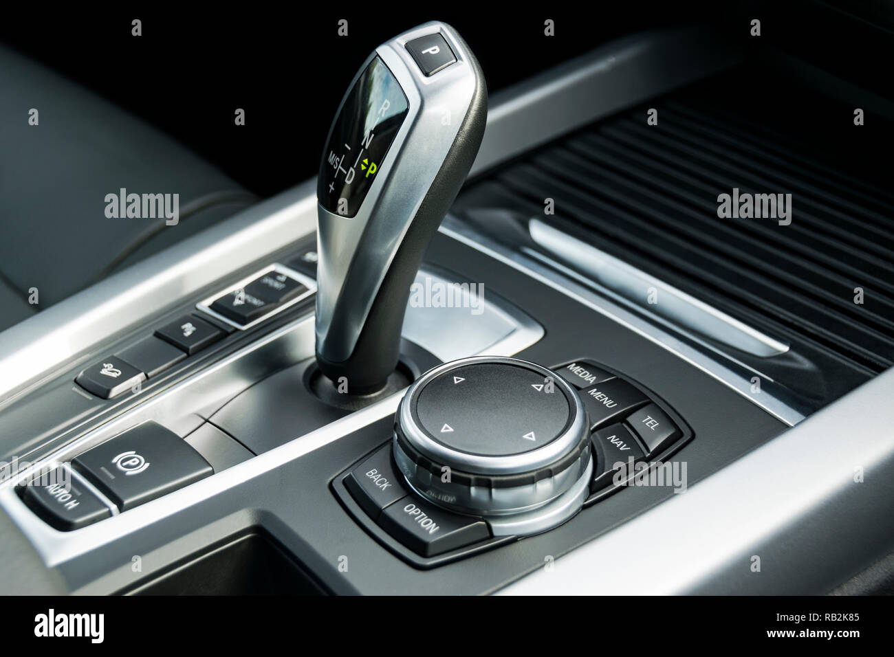 automatic gear stick of a modern car, car interior details Stock Photo ...