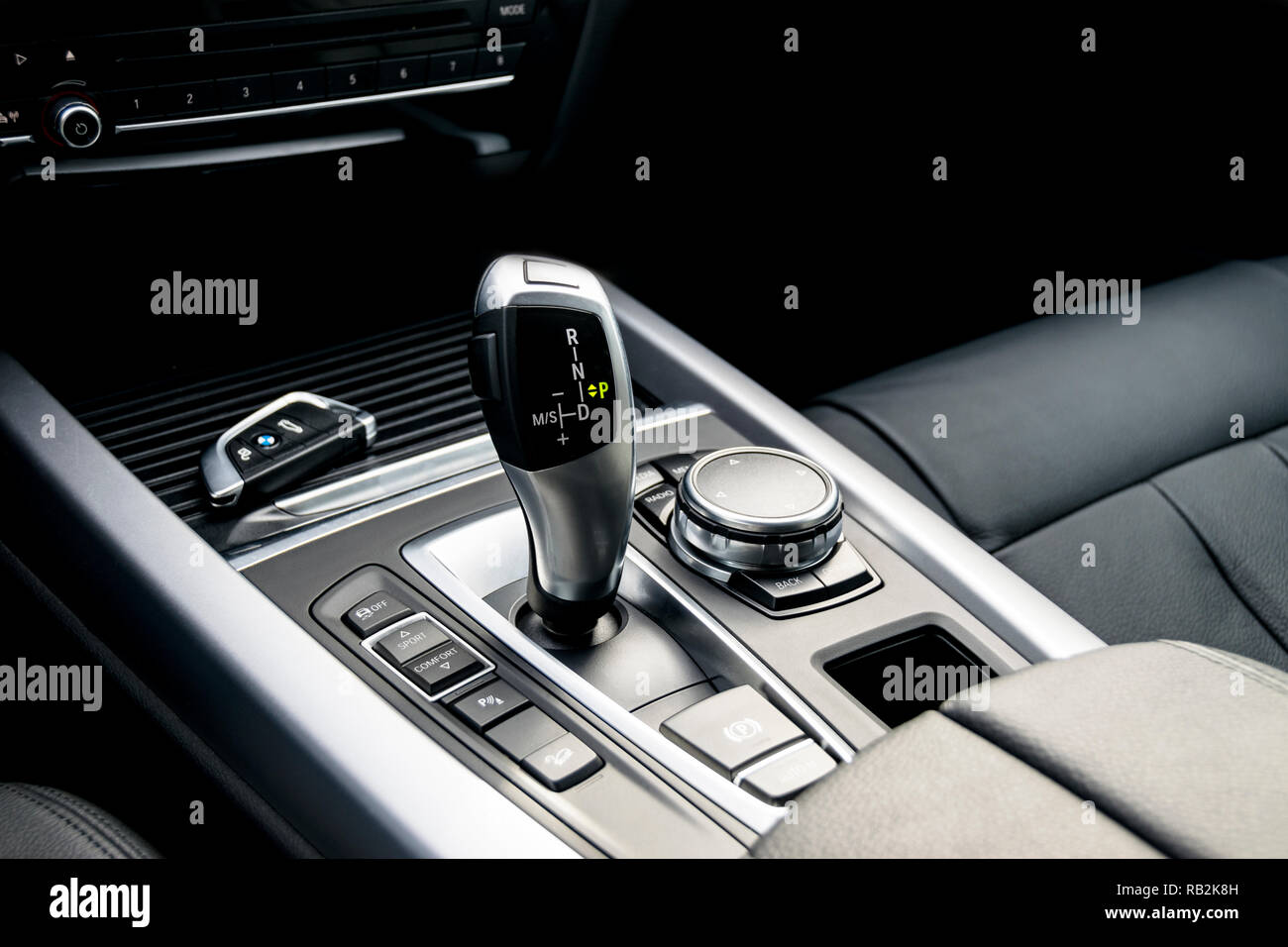 automatic gear stick of a modern car, car interior details Stock Photo ...