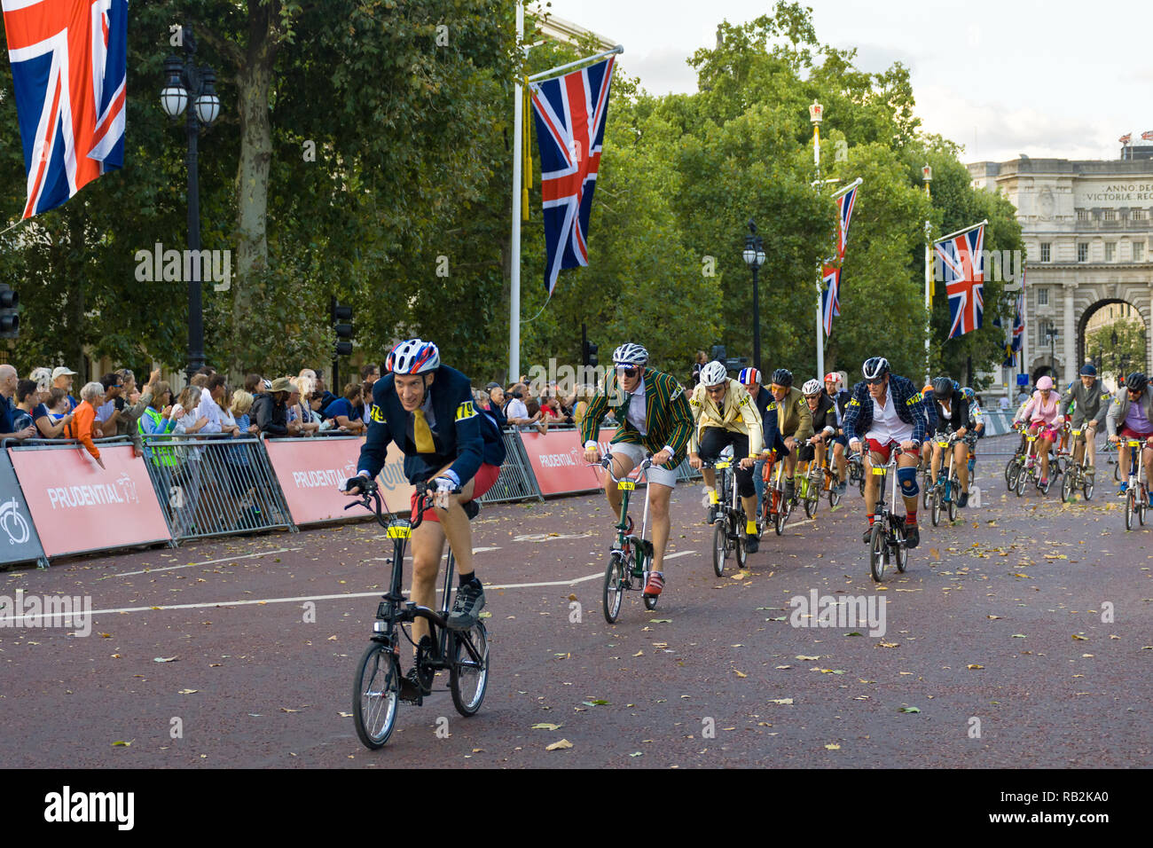 Cyclists racing along The Mall with onlooking crowd, Brompton World ...