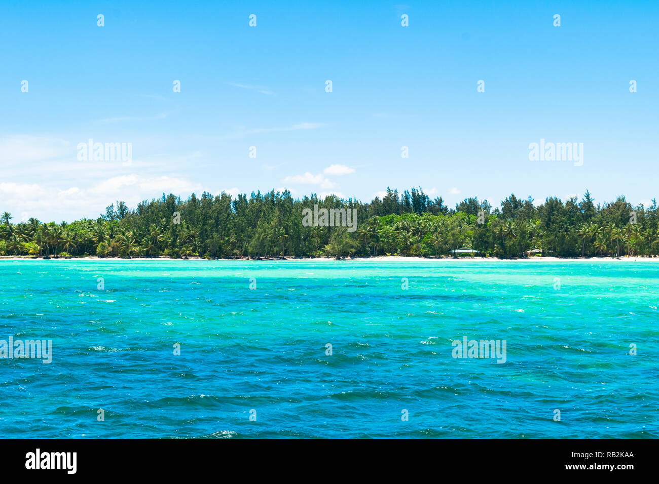 Oceanic landscape. blue aqua water with tropical island background ...