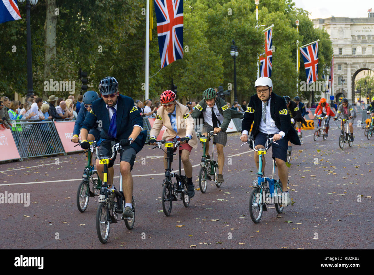 Cyclists racing along The Mall with onlooking crowd, Brompton World ...