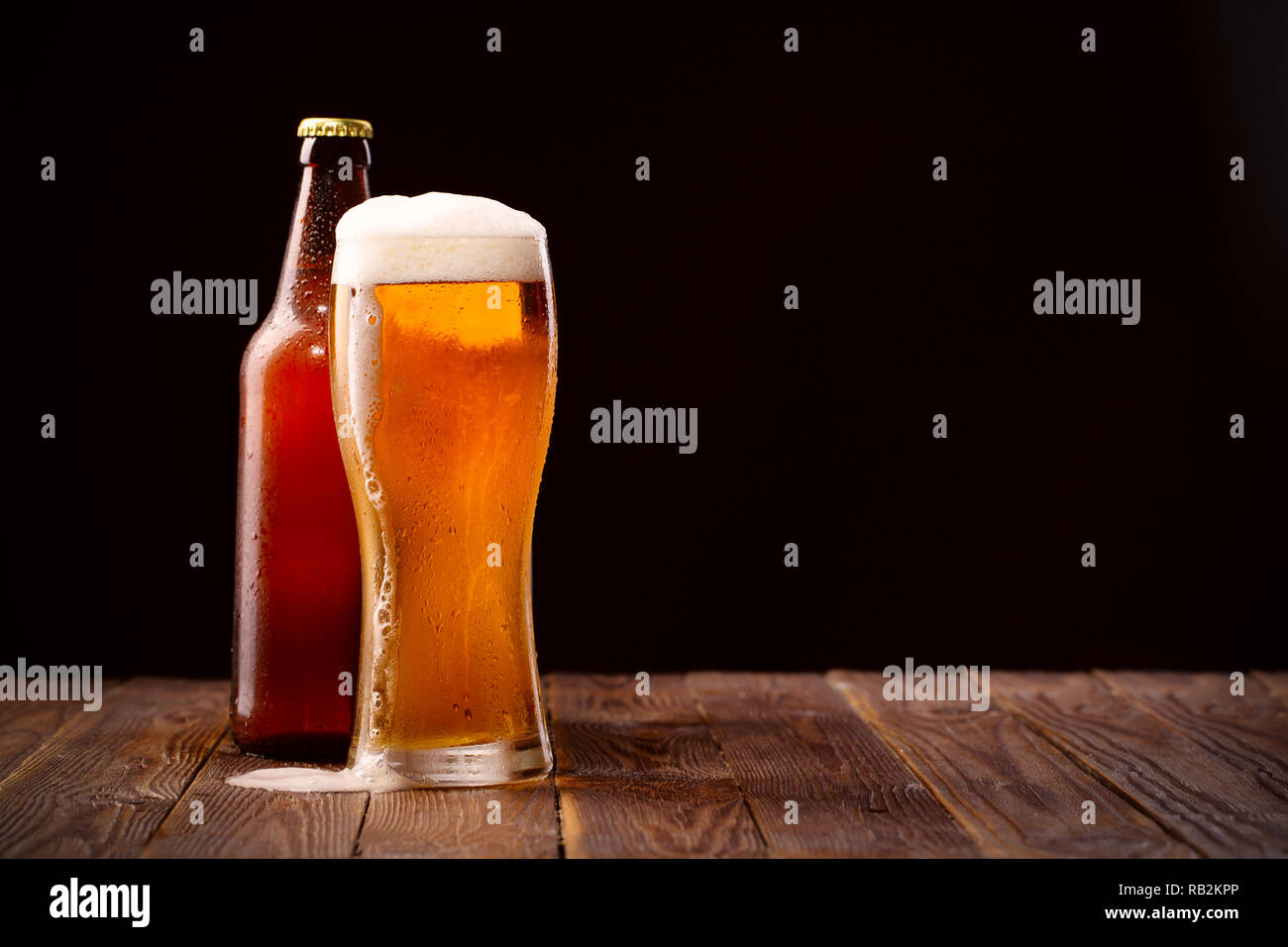 Photo of buttle and glass of beer Stock Photo - Alamy