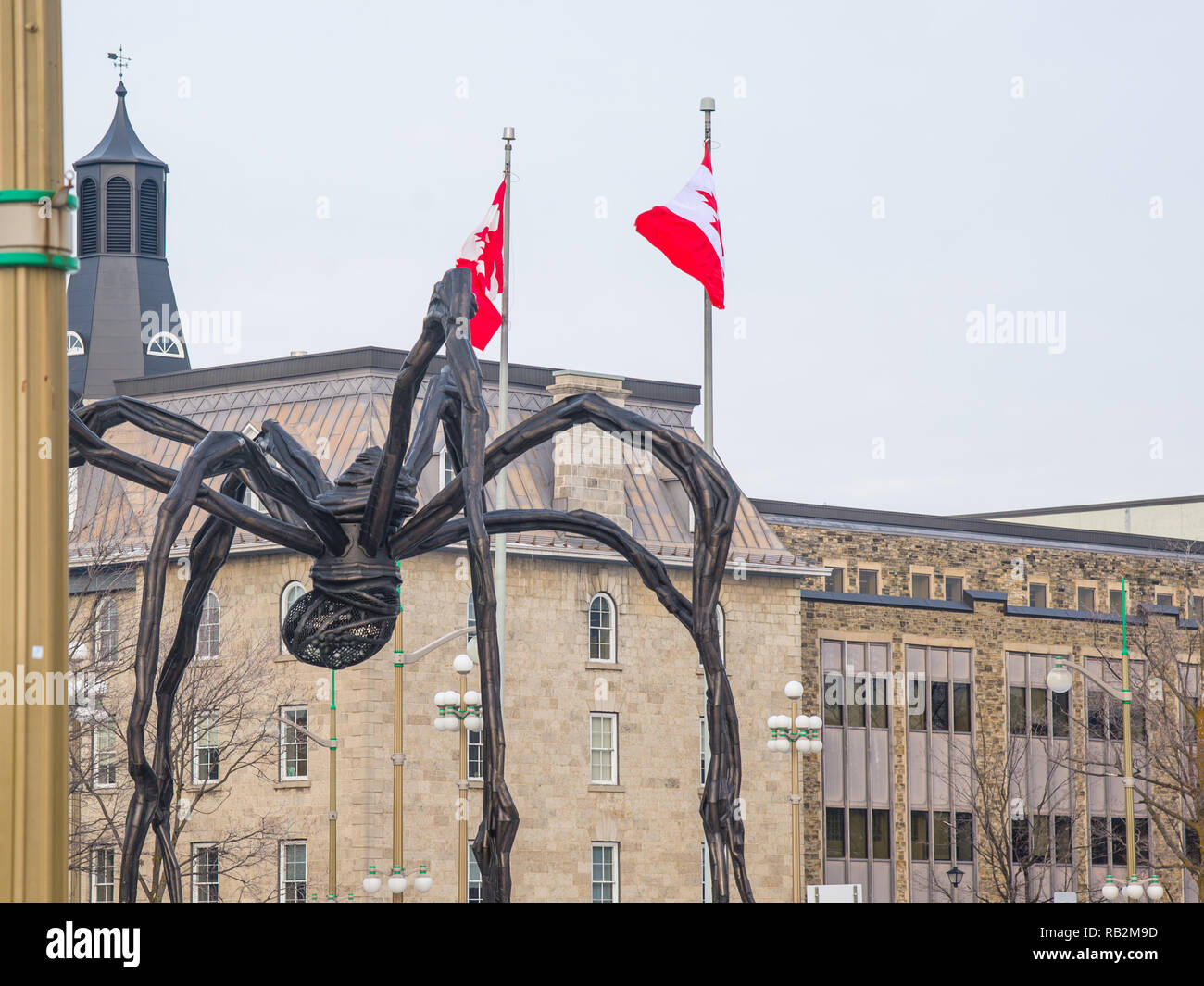 Spider statue in front of the national gallery and the notre dame ...