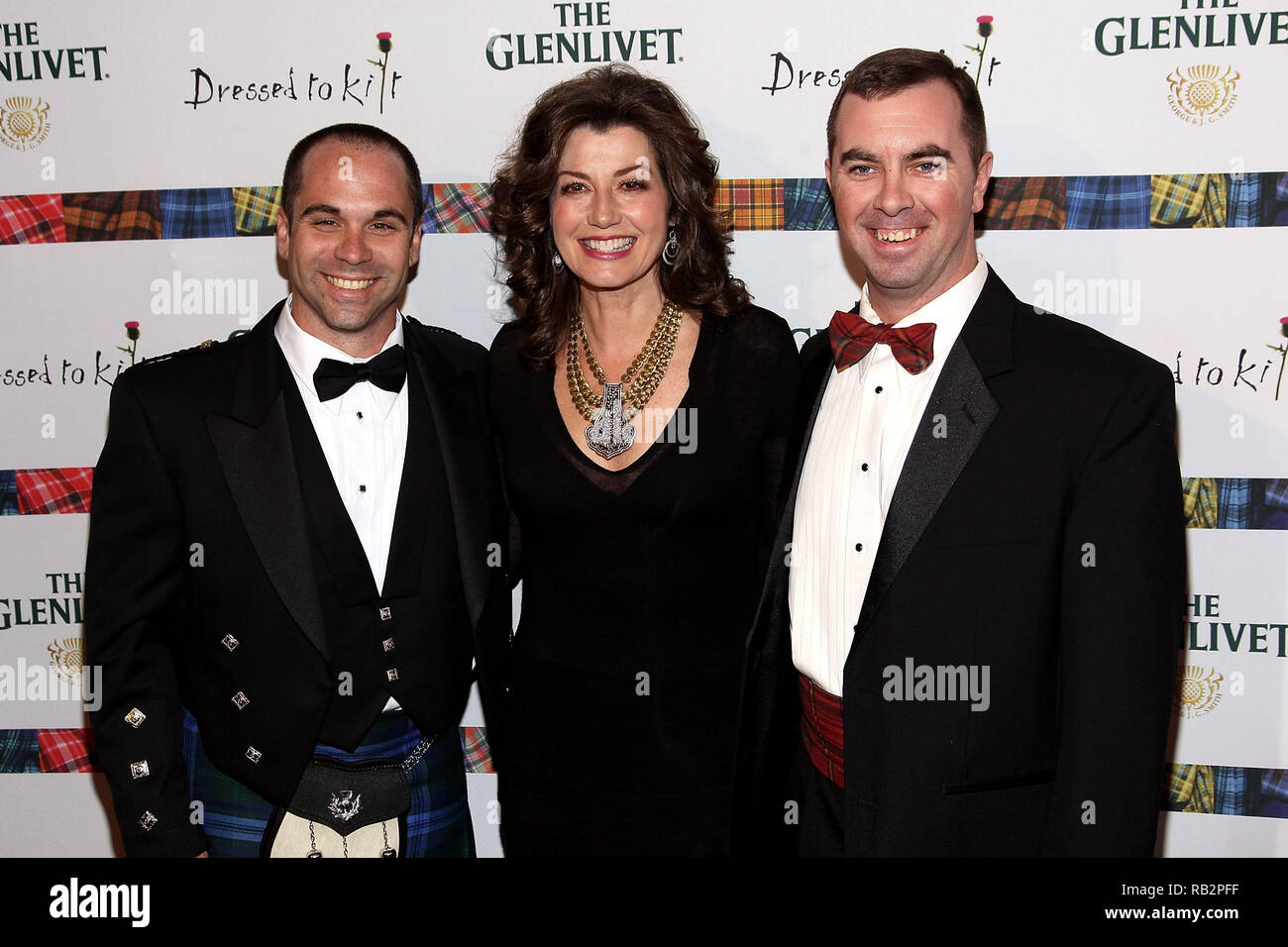 New York, NY / USA - April 5, 2011: Brian Jones, singer Amy Grant and ...