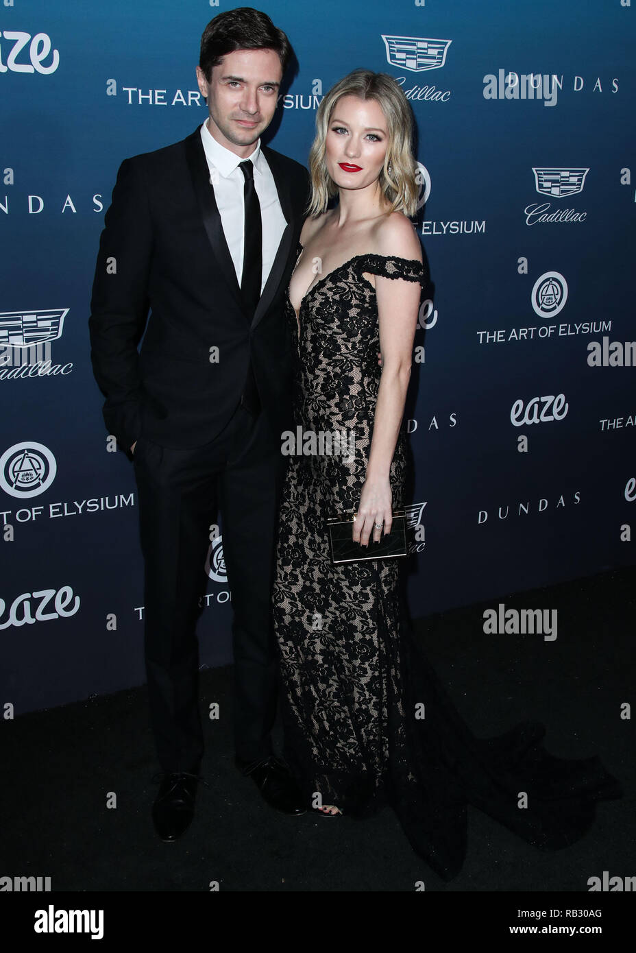 LOS ANGELES, USA - JANUARY 05: Actor Topher Grace and wife Ashley ...