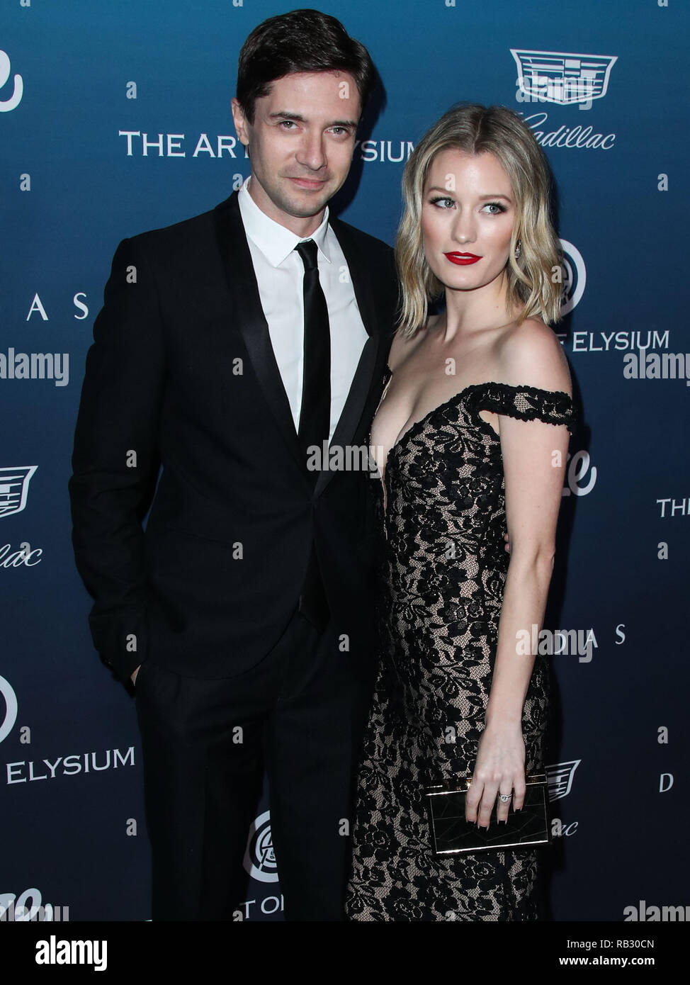 LOS ANGELES, USA - JANUARY 05: Actor Topher Grace and wife Ashley ...