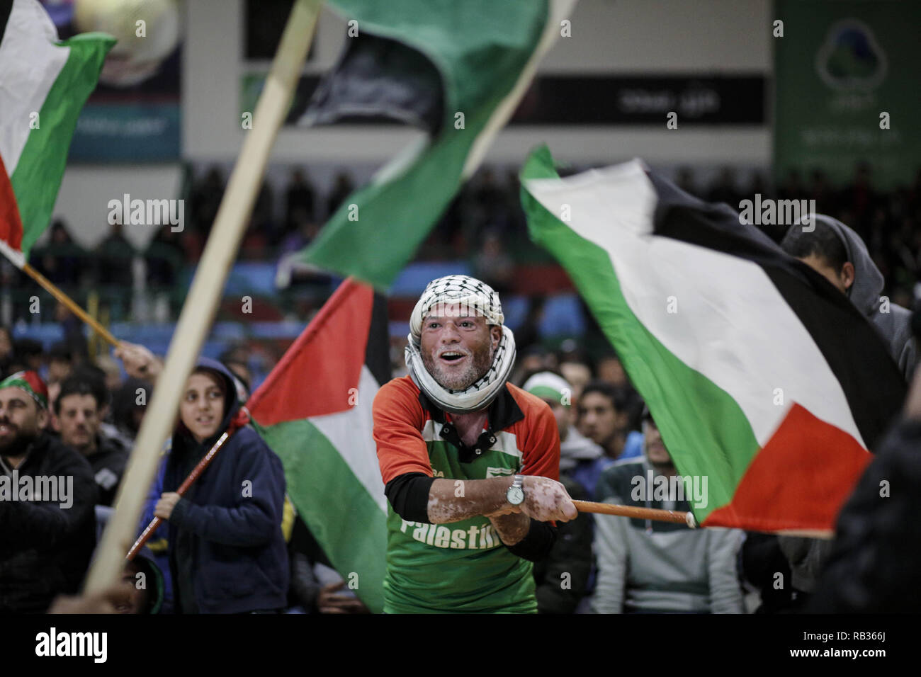 Gaza City, Palestine. 6th Jan, 2019. A fan seen waving the Palestinian ...