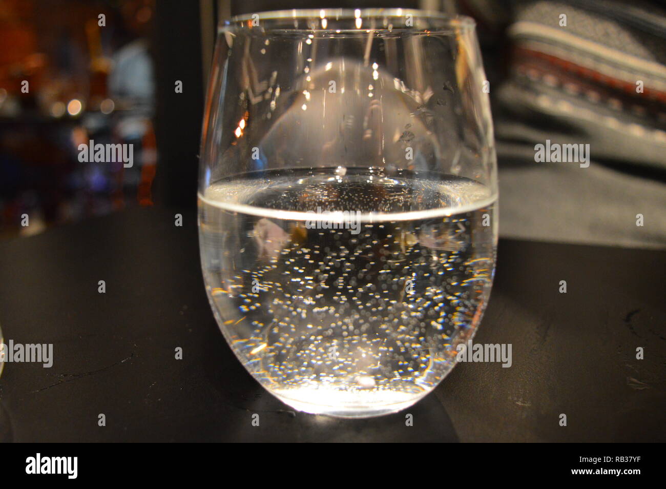 A glass of water in a bar Stock Photo - Alamy