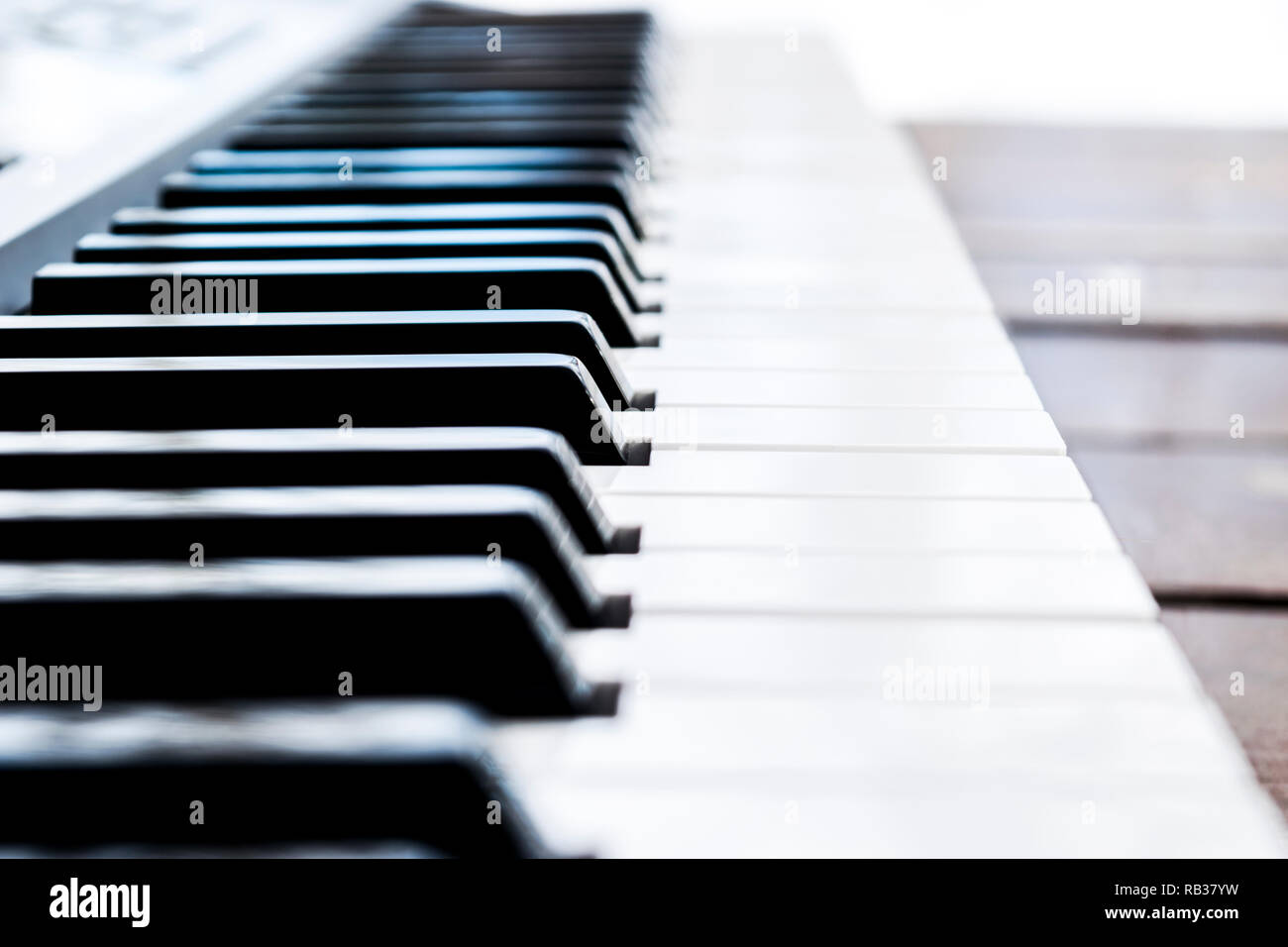 Side view of piano keys. Close-up of piano keys. Close frontal view ...