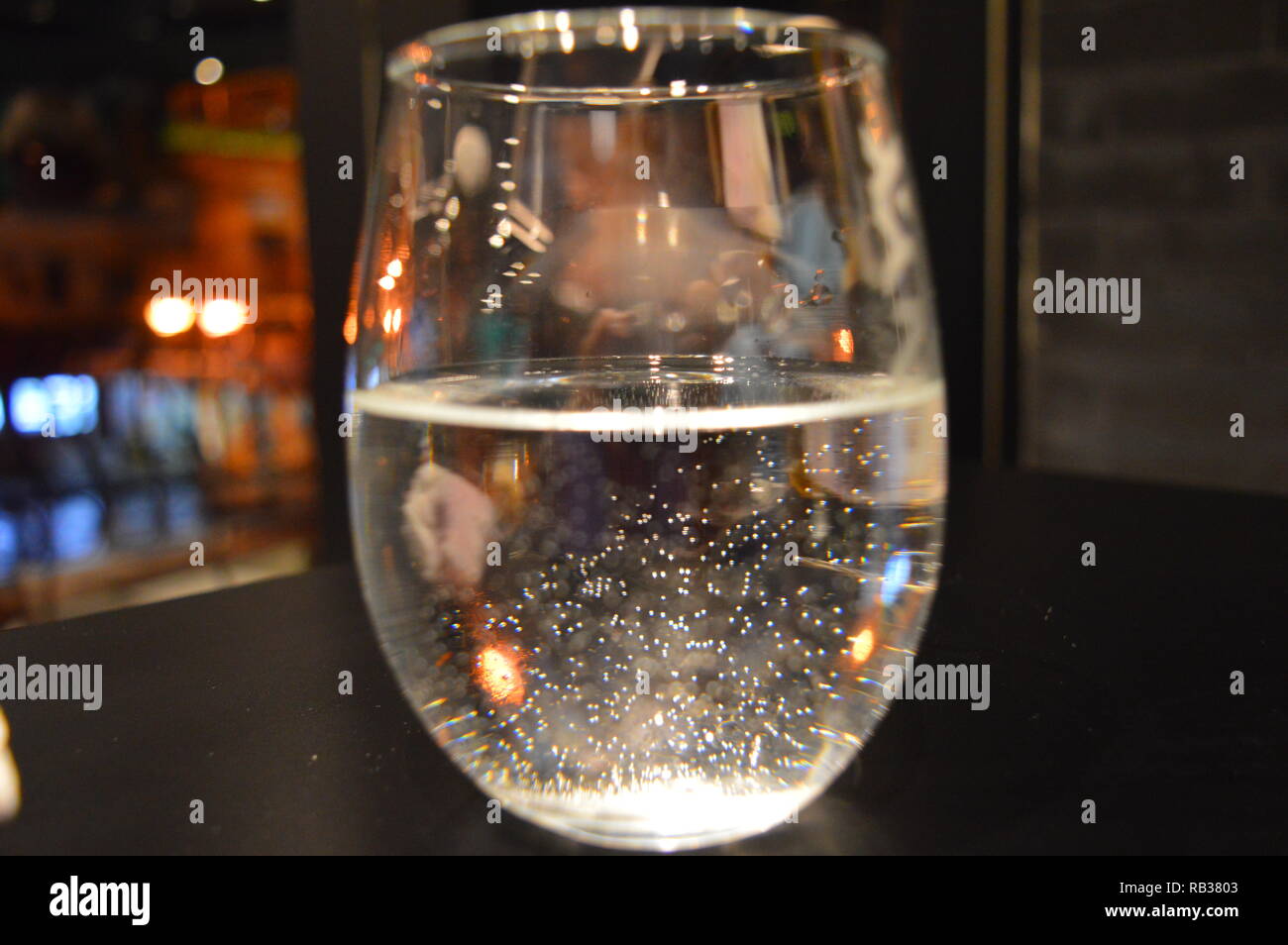 A glass of water in a bar Stock Photo - Alamy