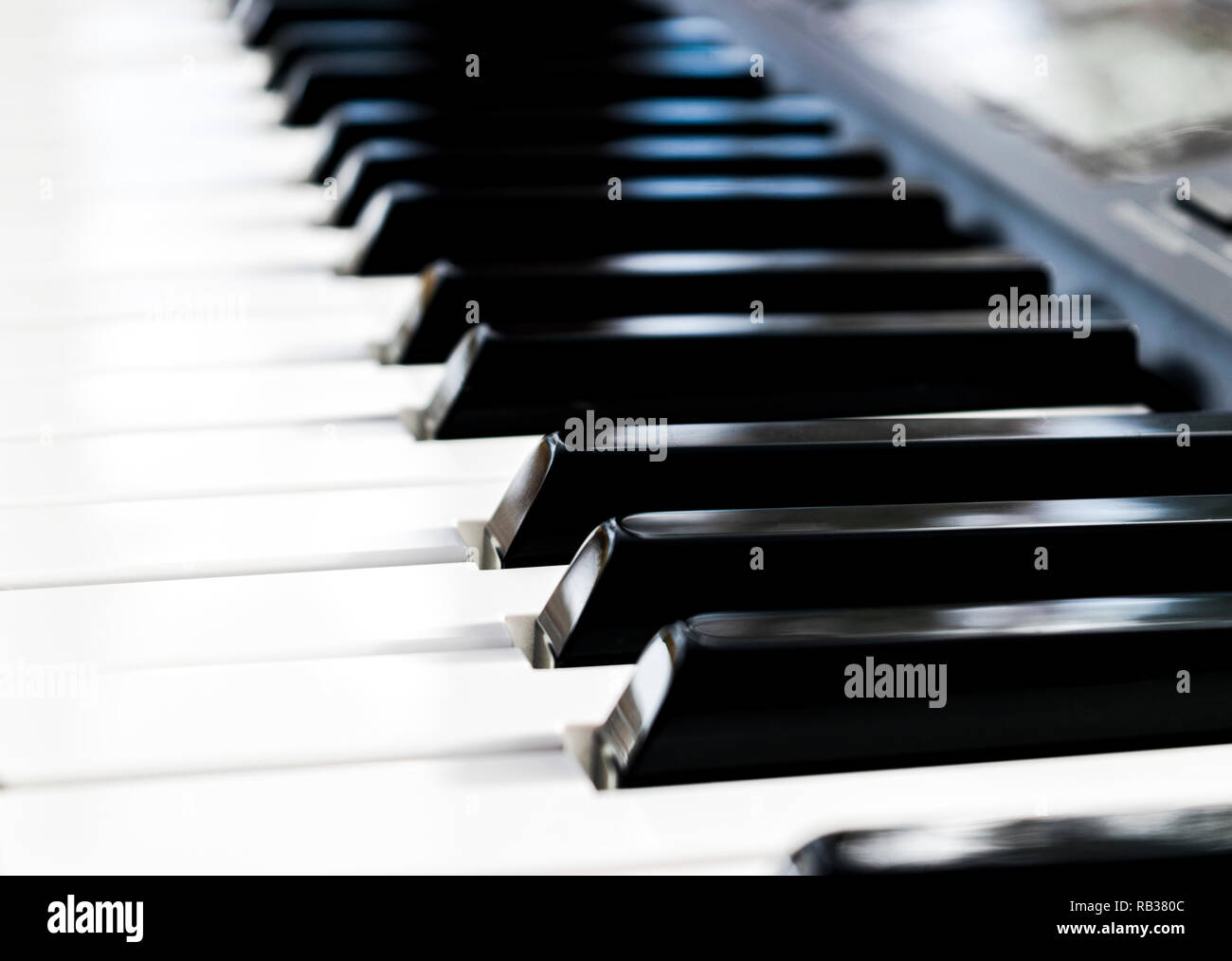 Side view of piano keys. Close-up of piano keys. Close frontal view ...