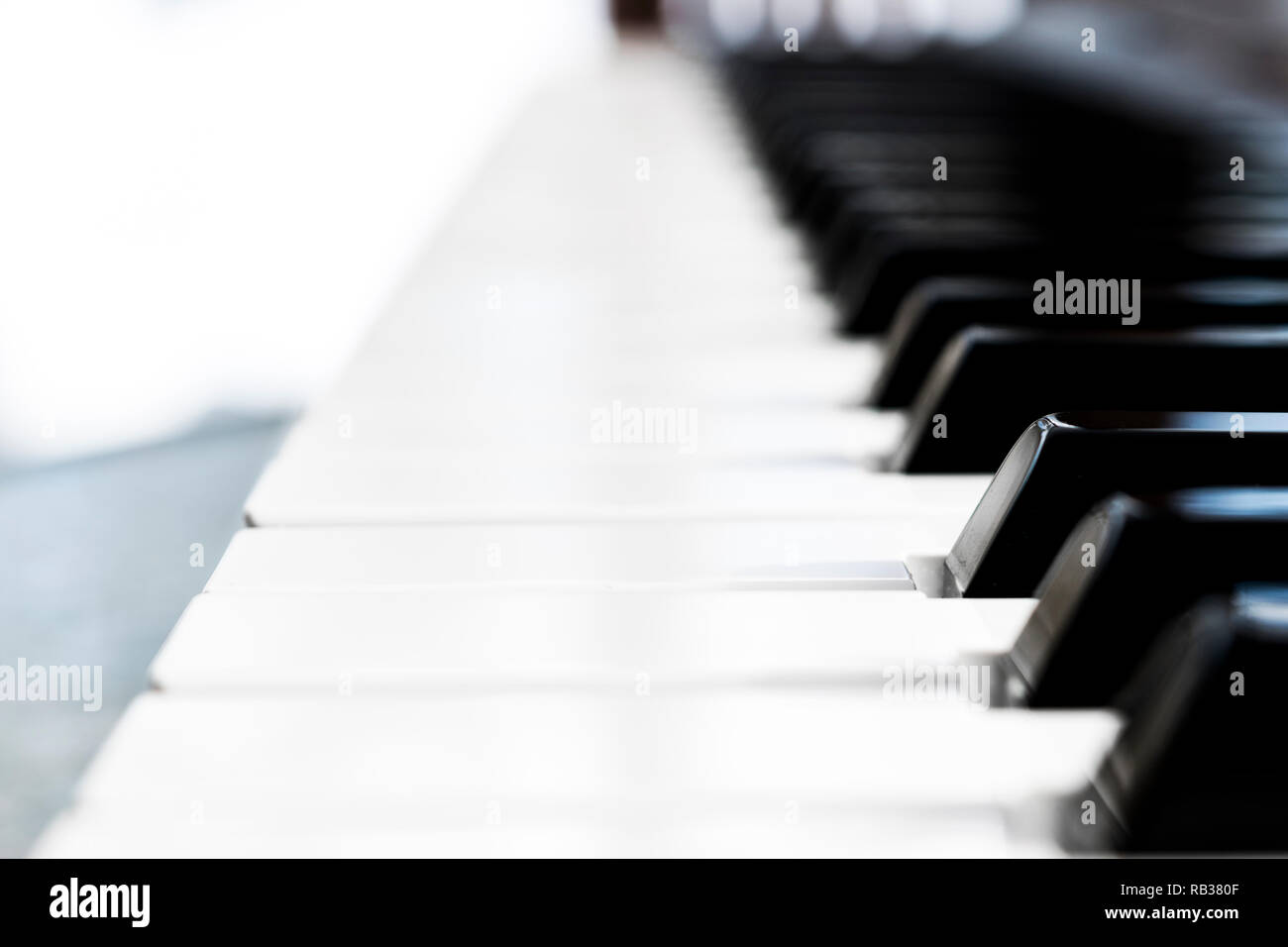 Side view of piano keys. Close-up of piano keys. Close frontal view ...
