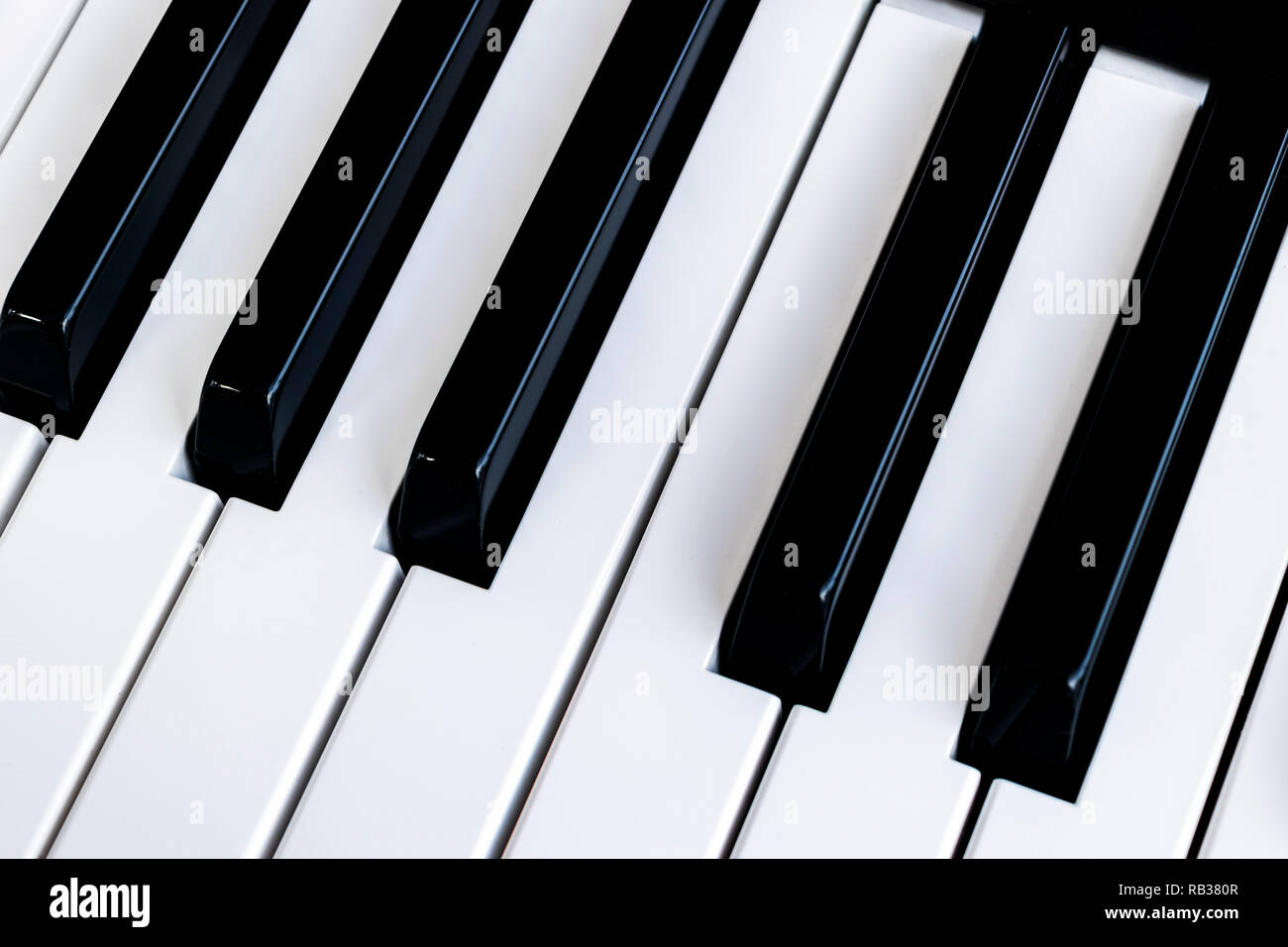 Top view of piano keys. Close-up of piano keys. Close frontal view ...