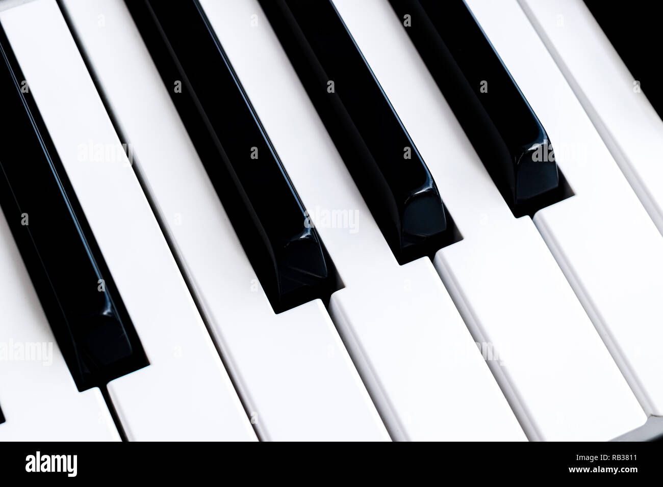 Top view of piano keys. Close-up of piano keys. Close frontal view ...