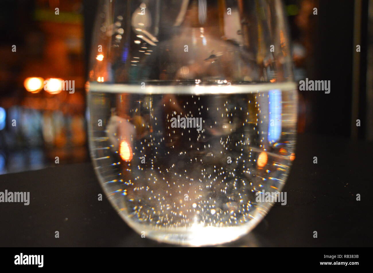 A glass of water in a bar Stock Photo - Alamy
