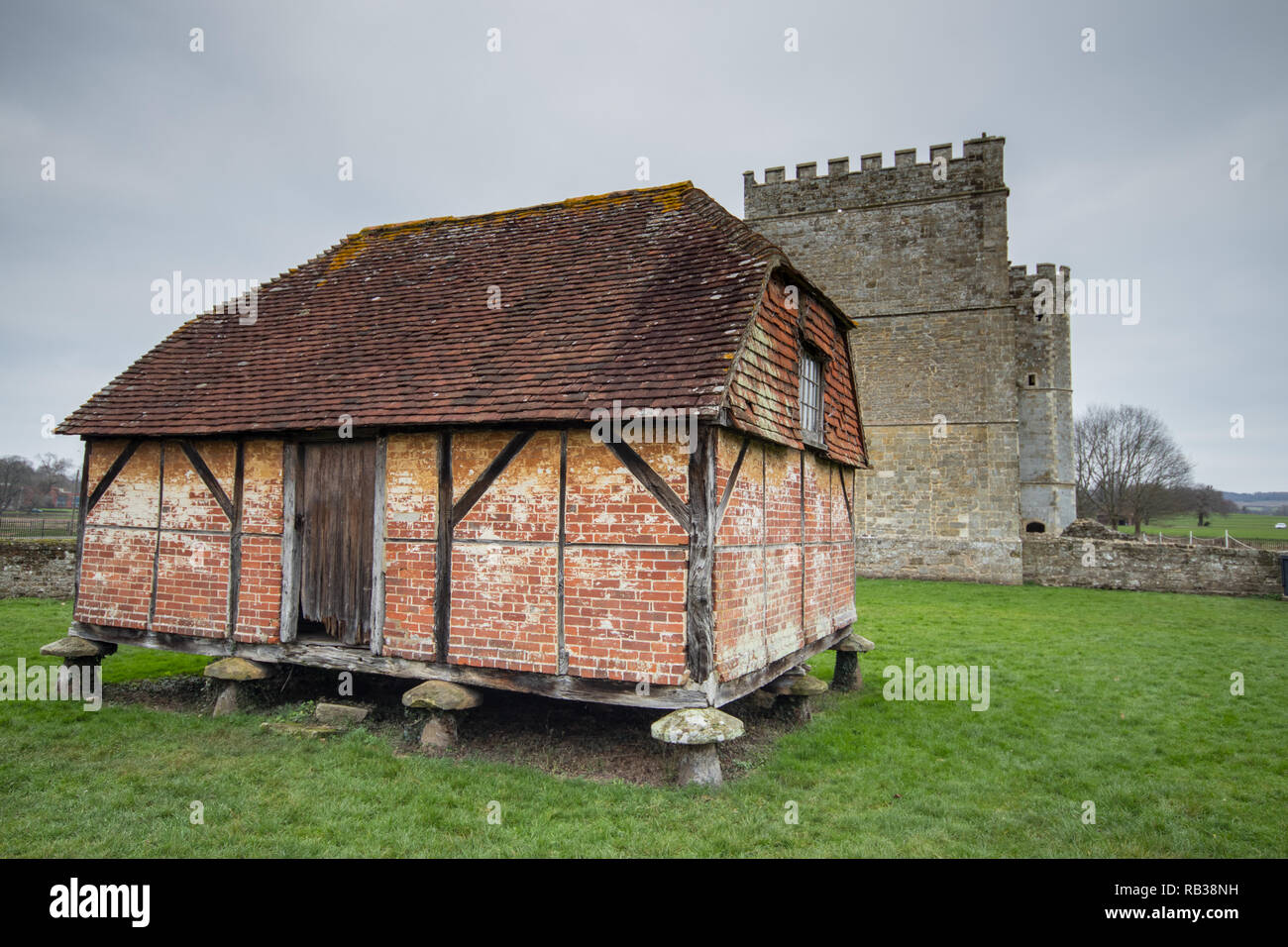 A traditional grain store besides the ruins of Cowdray House, Midhurst ...