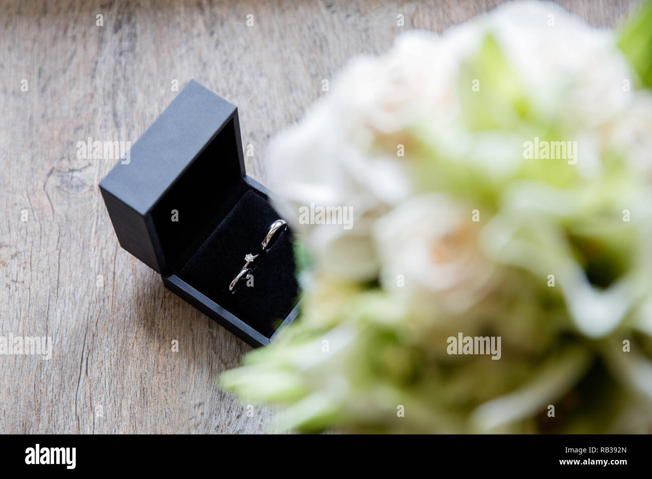Wedding rings in a black jewelry box Stock Photo - Alamy