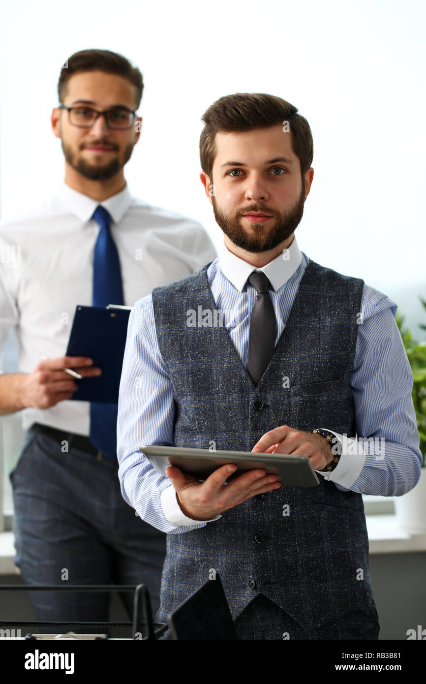 Group of smiling bearded clerk men at workplace Stock Photo - Alamy