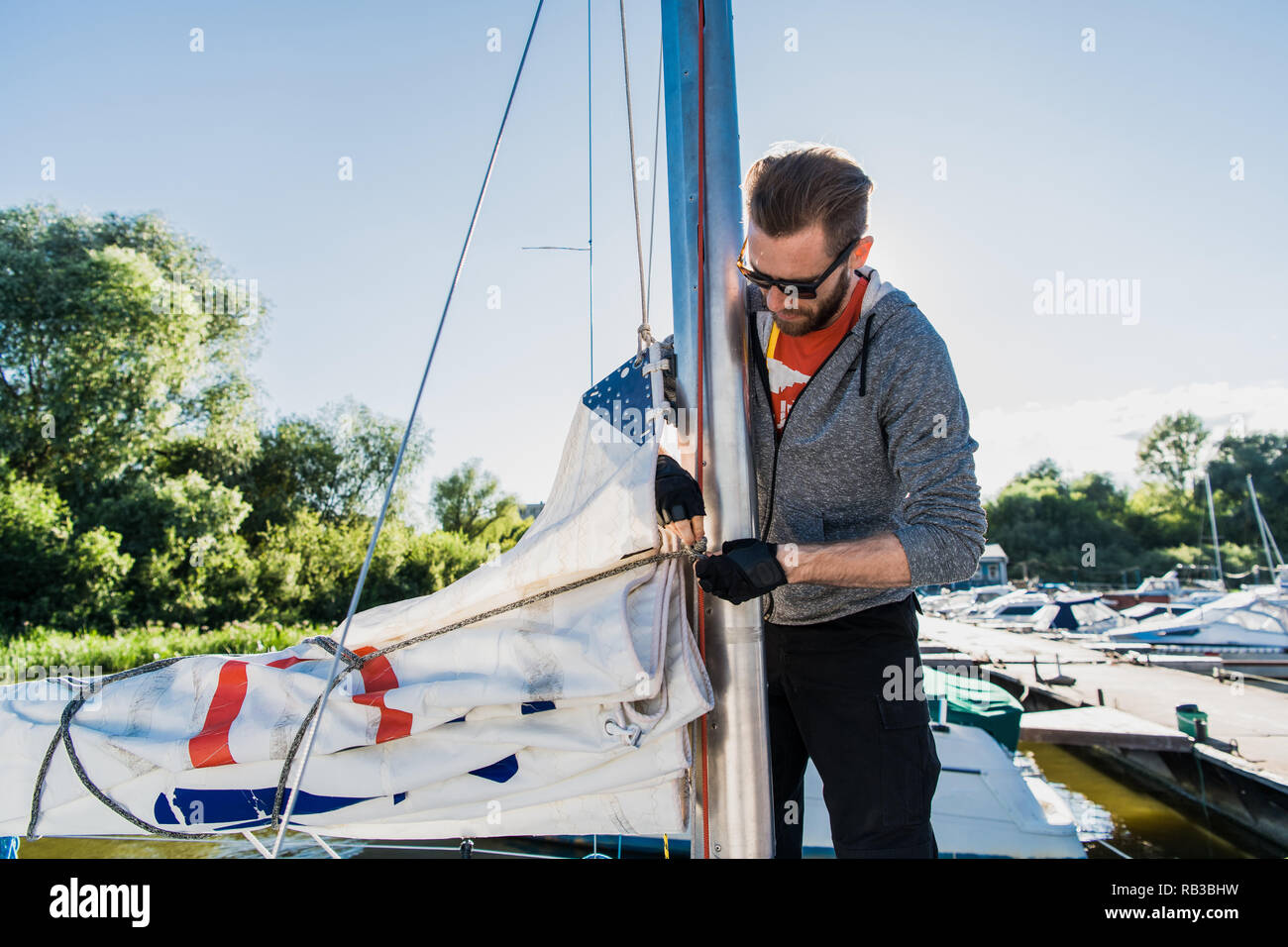 Sunny sailor hi-res stock photography and images - Alamy
