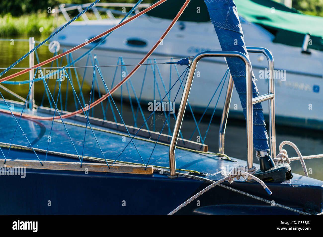 The rigging block with swivel and yellow rope. Part of the rigging of ...