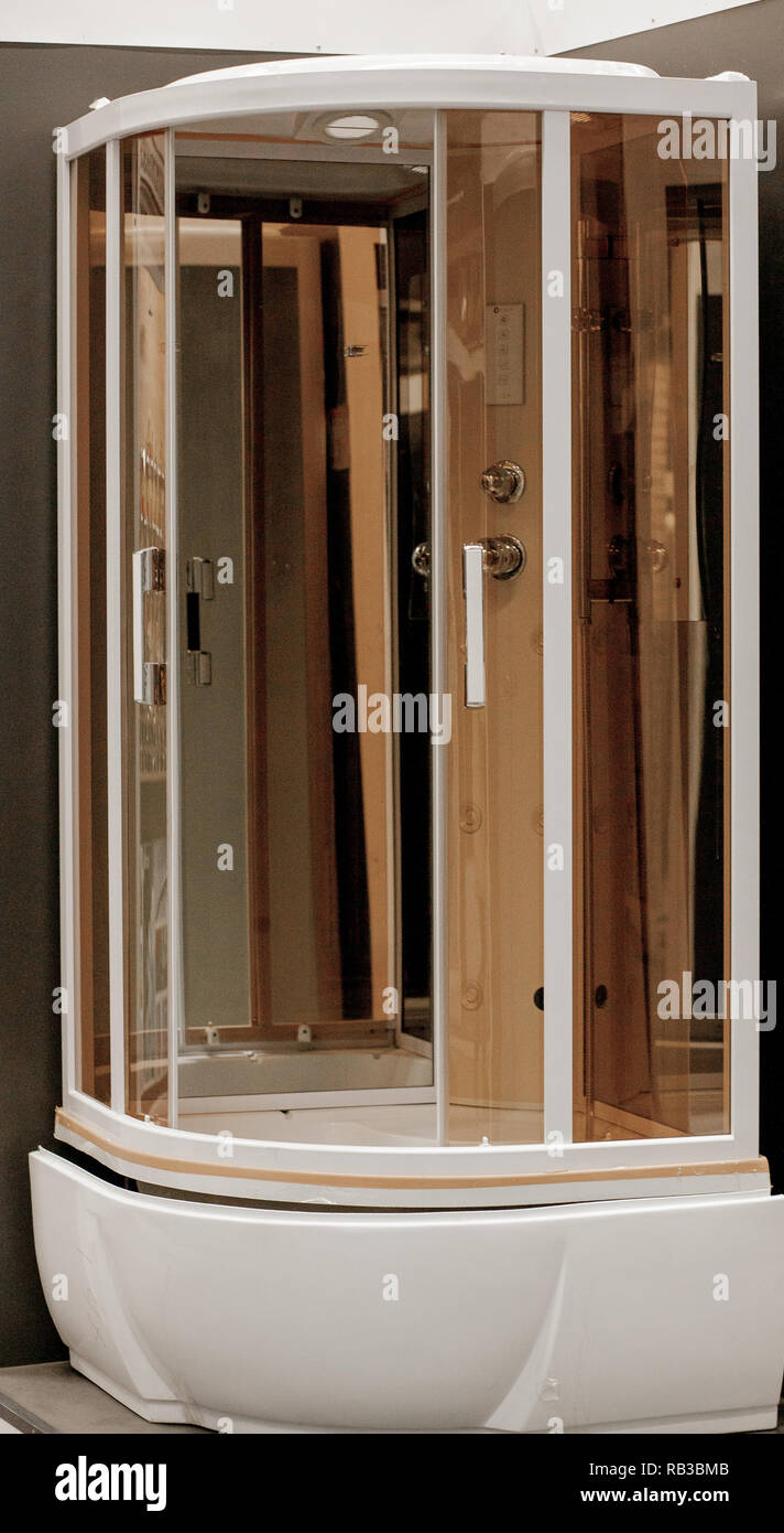 Modern and big shower cabin in bathroom corner Stock Photo - Alamy