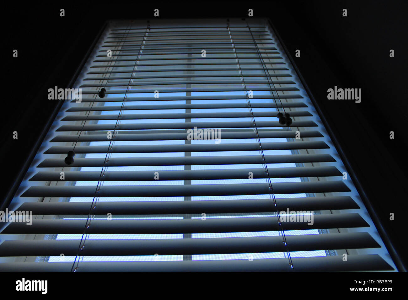 Blue window shades hi-res stock photography and images - Alamy