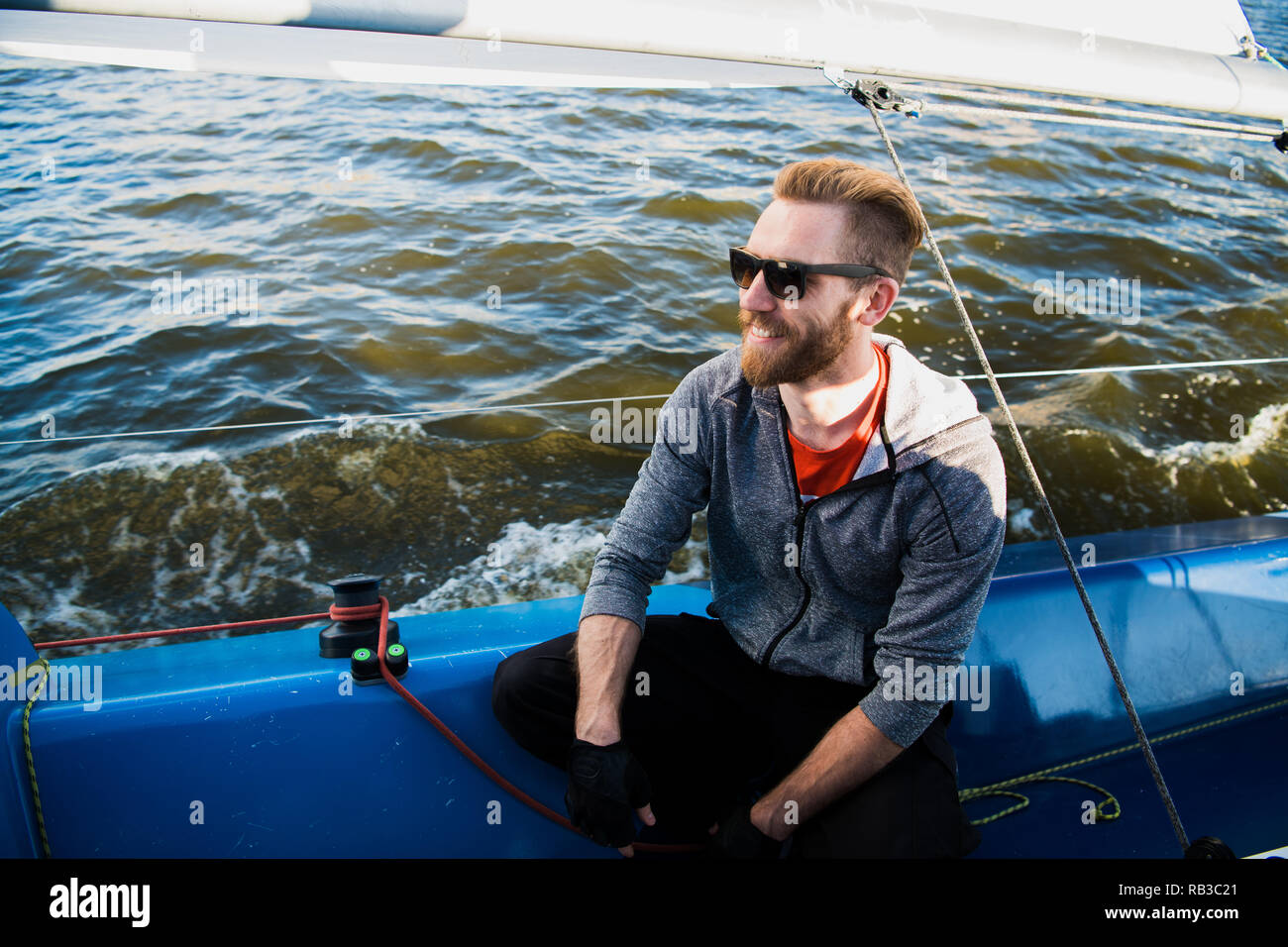 Man driving small boat hi-res stock photography and images - Alamy