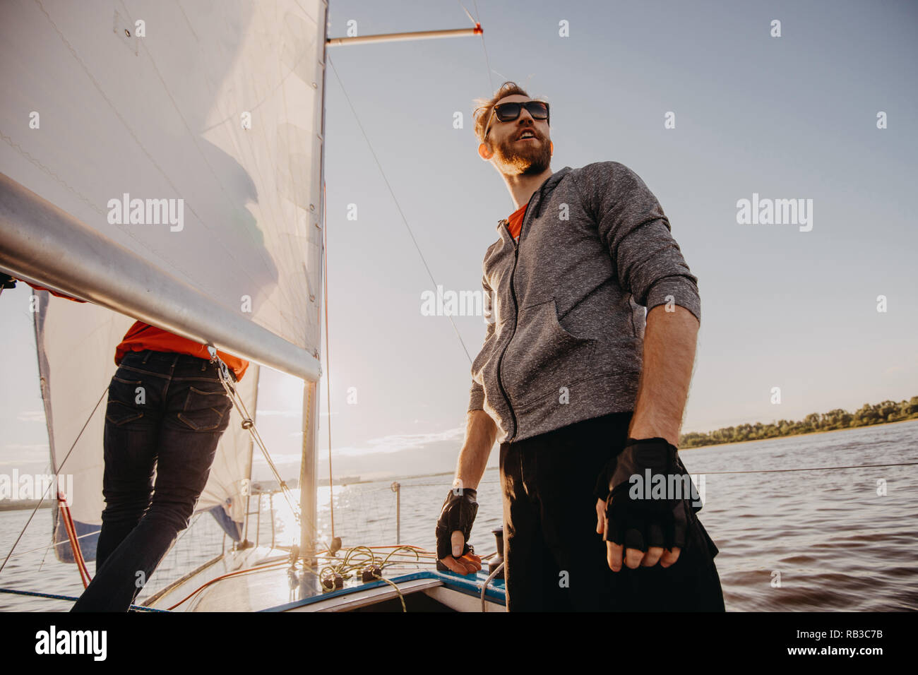 Portrait of man on sailboat hi-res stock photography and images - Alamy