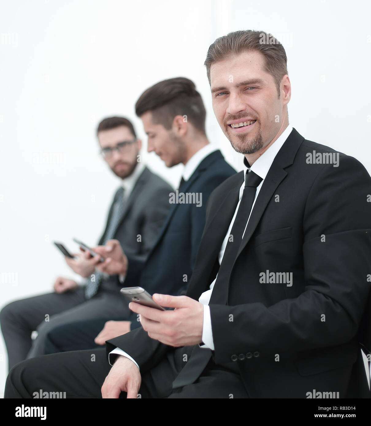 group of business people sitting in the office reception Stock Photo ...