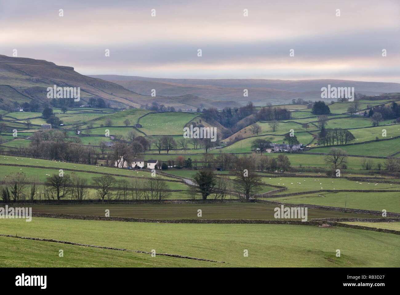 A Winter sky above the hamlet of Wharfe in Crummack Dale, near Austwick ...
