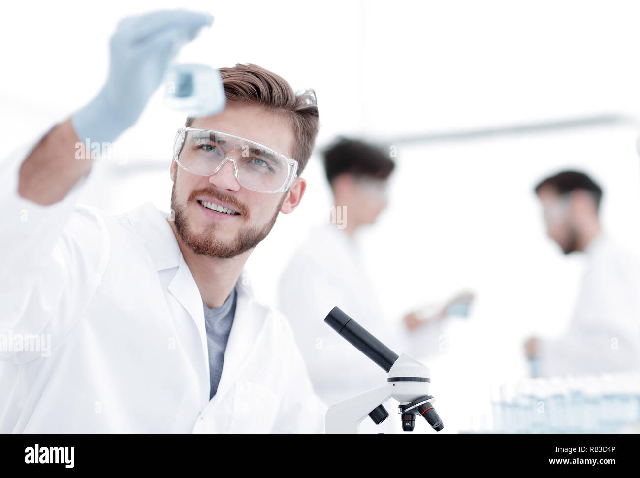 closeup.a scientist doing experiments in the laboratory Stock Photo - Alamy