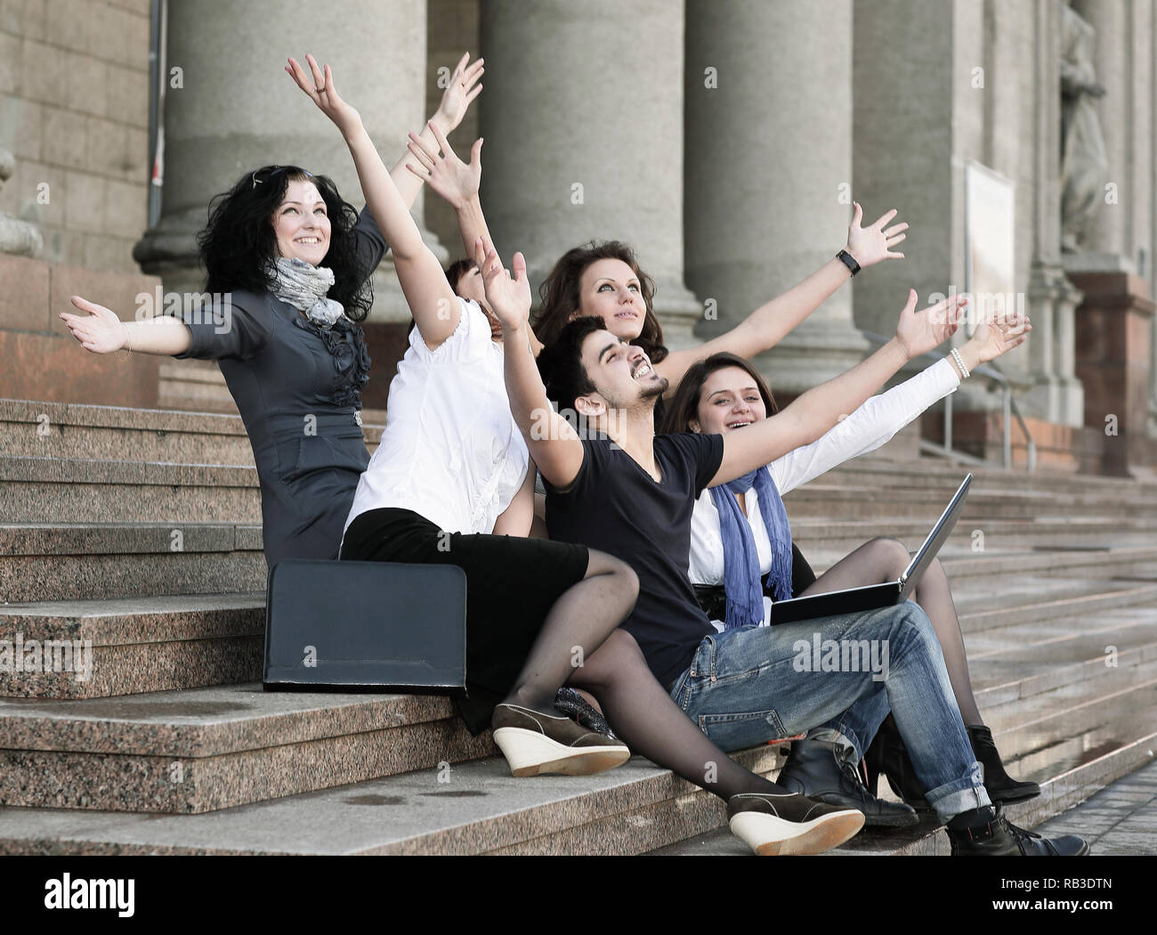 group of happy university students in front of university building ...