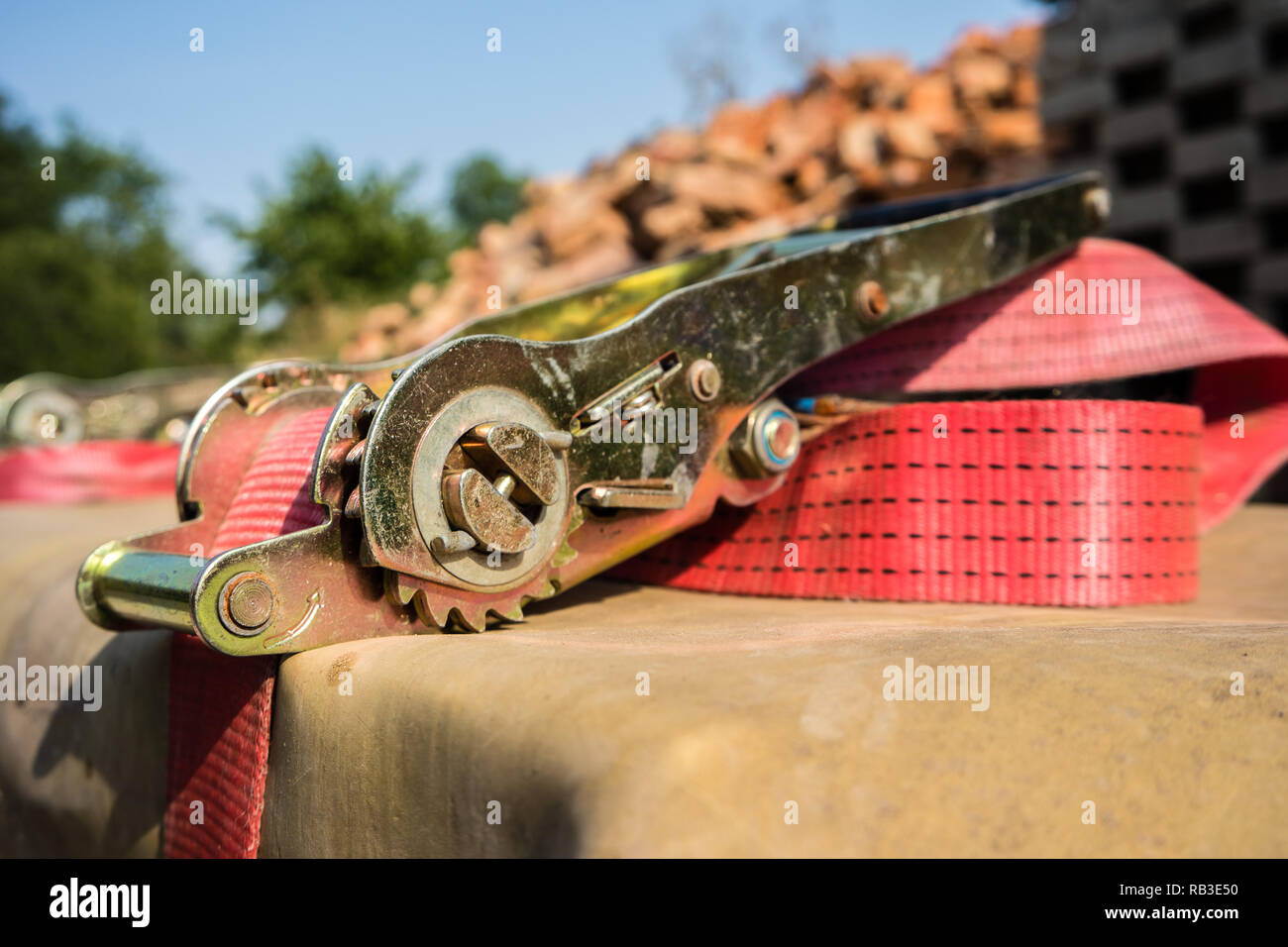 Truck lashing strap safety Stock Photo - Alamy