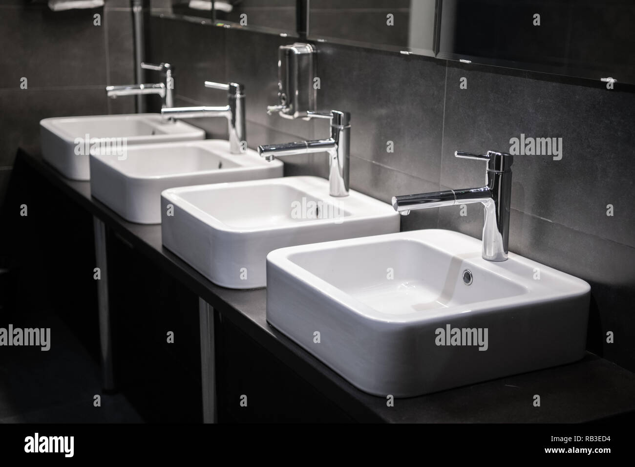 Empty Sinks In Public Restroom Bathroom High Resolution Stock ...