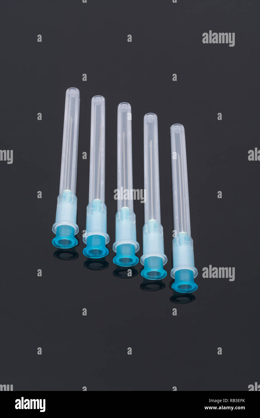 Close-up of hypodermic needles. Specifically BD Microlance brand - Blue ...