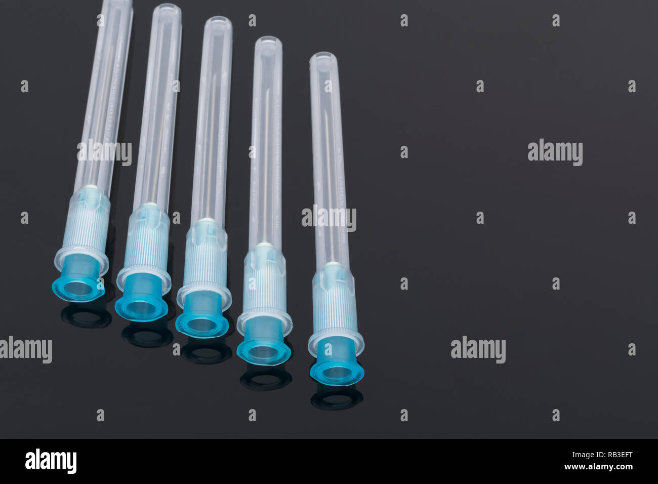 Close-up of hypodermic needles. Specifically BD Microlance brand - Blue ...