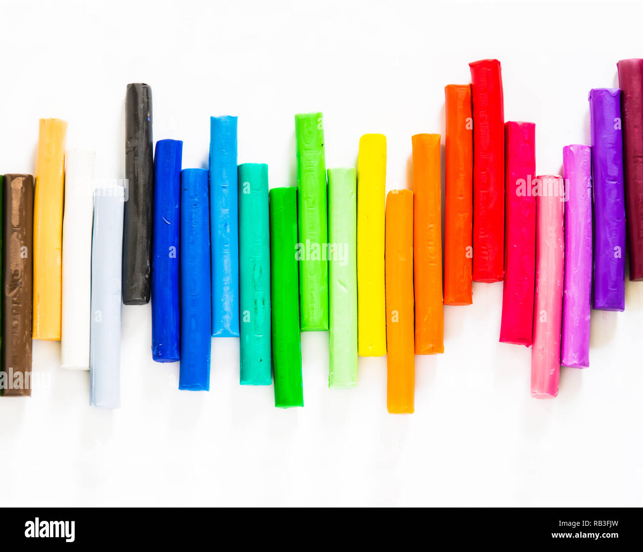 modeling clay of different colors background Stock Photo - Alamy