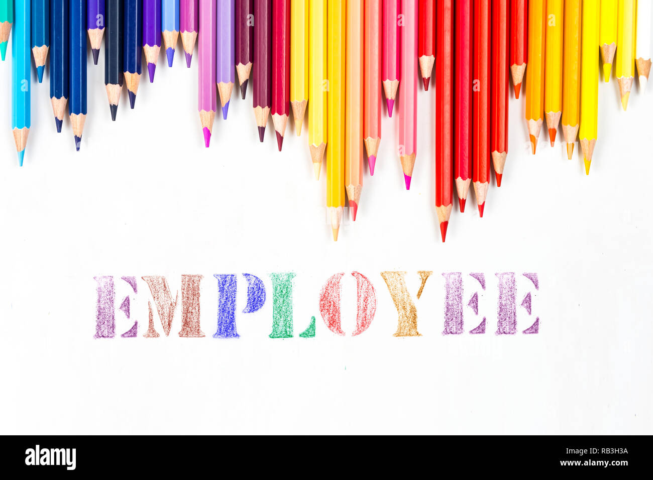 Employee drawing by colour pencils Stock Photo - Alamy