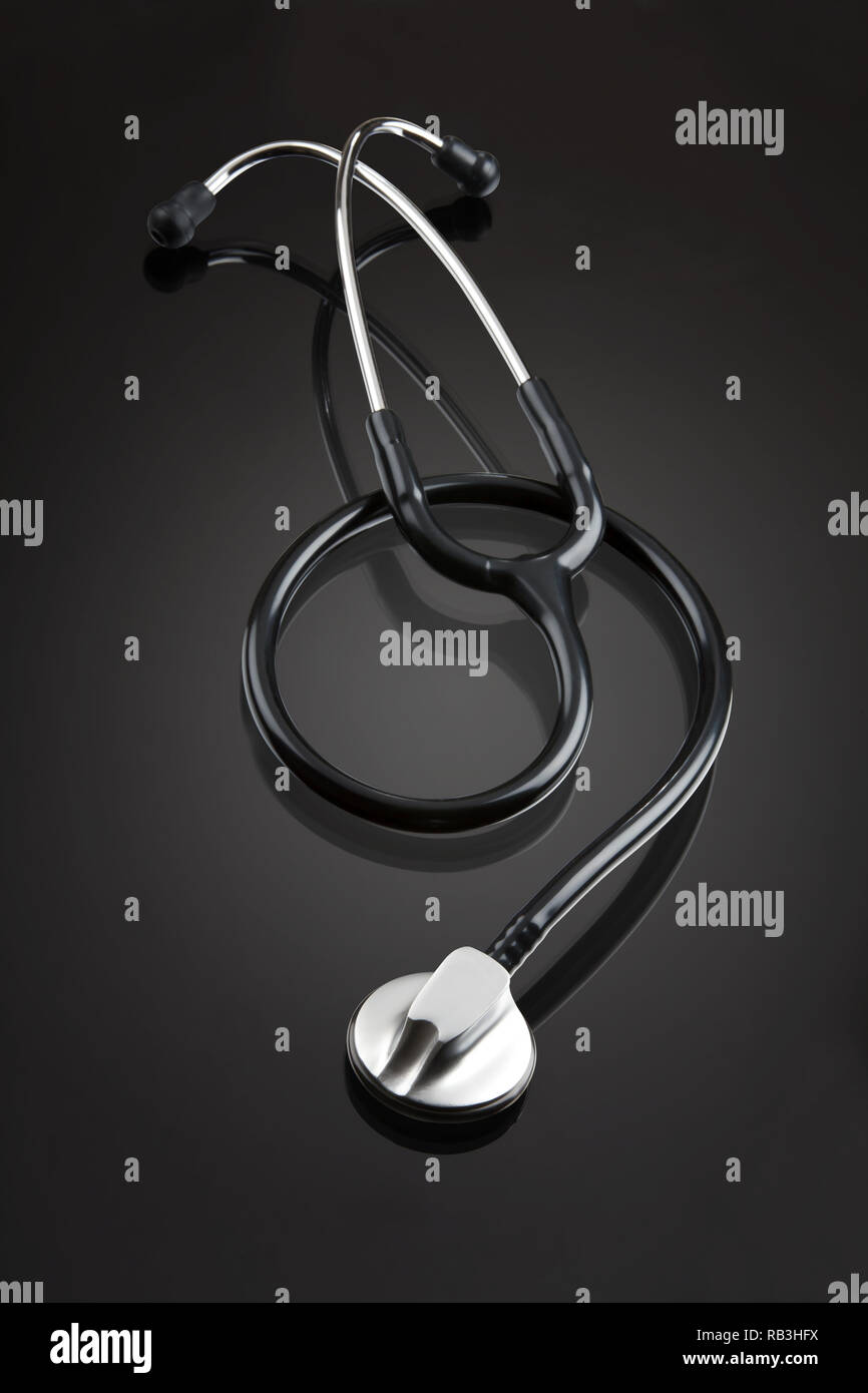 stethoscope on dark glass with clipping path Stock Photo - Alamy