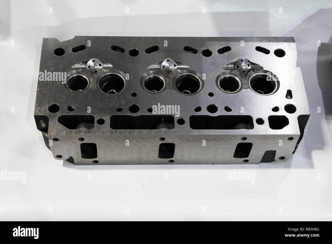 As machined head cylinder from iron casting ; close up Stock Photo - Alamy