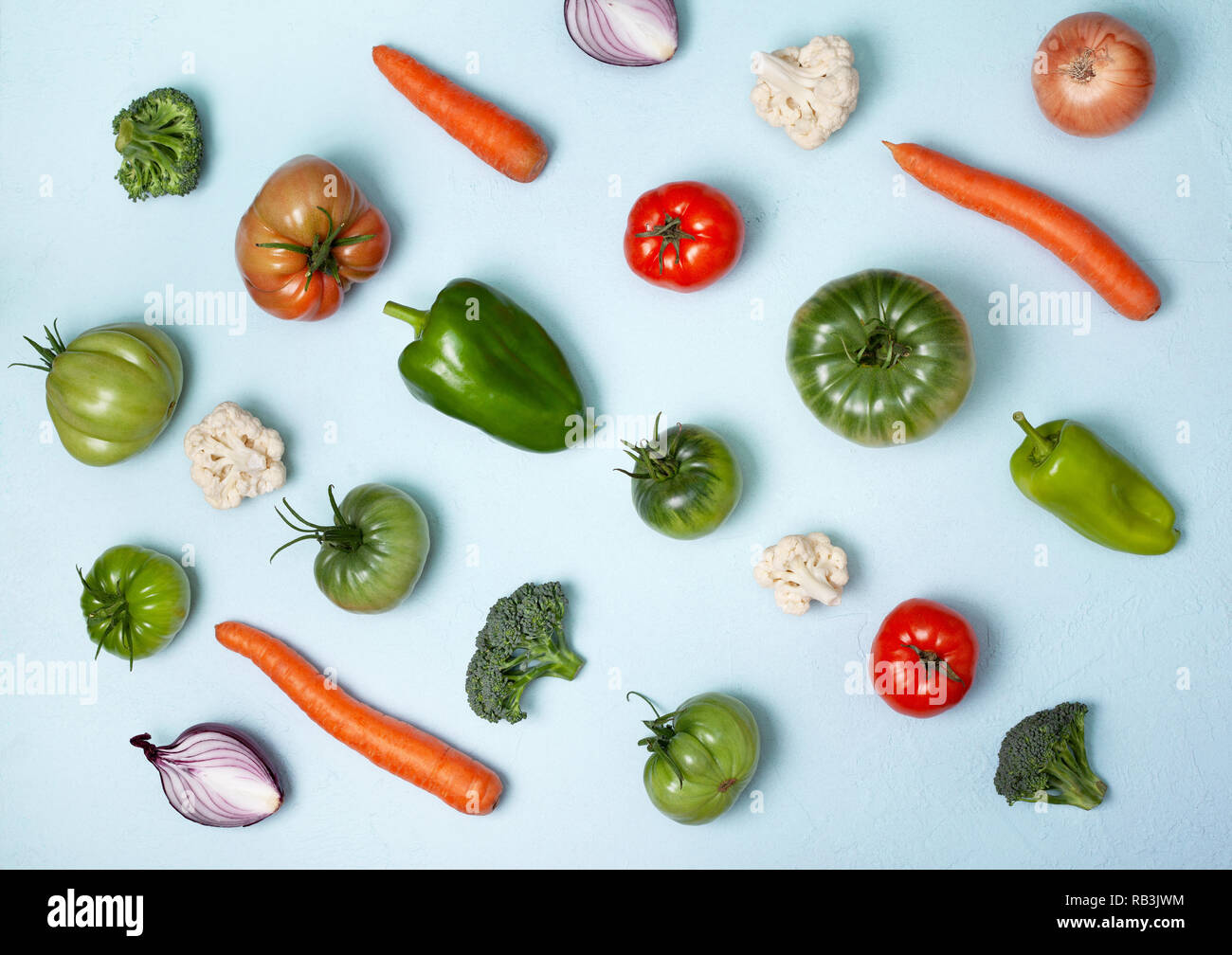 abstract food background. fresh vegetables on a blue background. view ...
