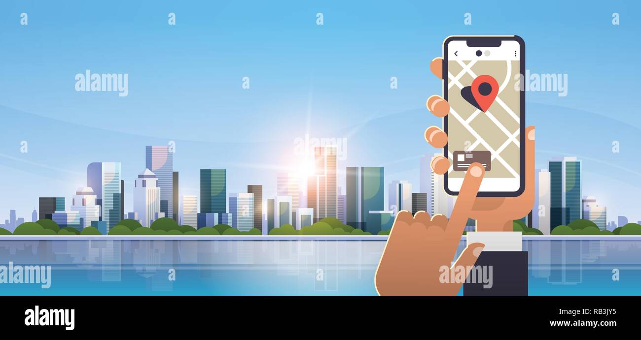 hand holding cell phone using online mobile map application gps navigation concept over modern ...