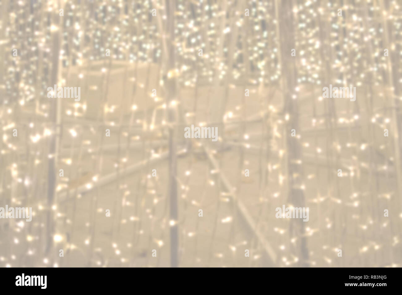 Abstract golden background texture with string lights New Years Eve ...